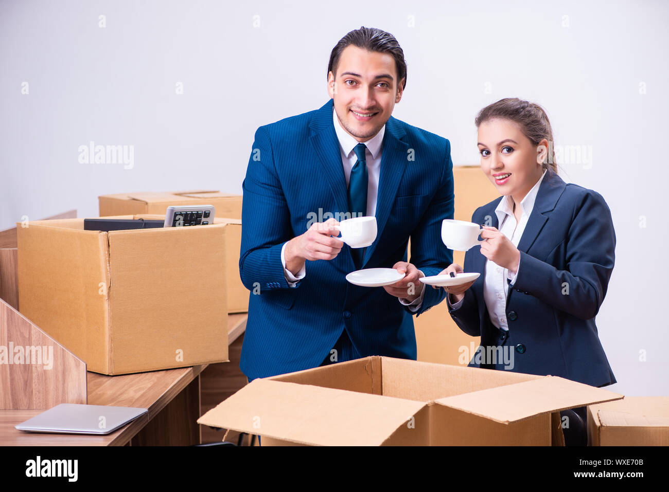 Two employees being fired from their work Stock Photo - Alamy