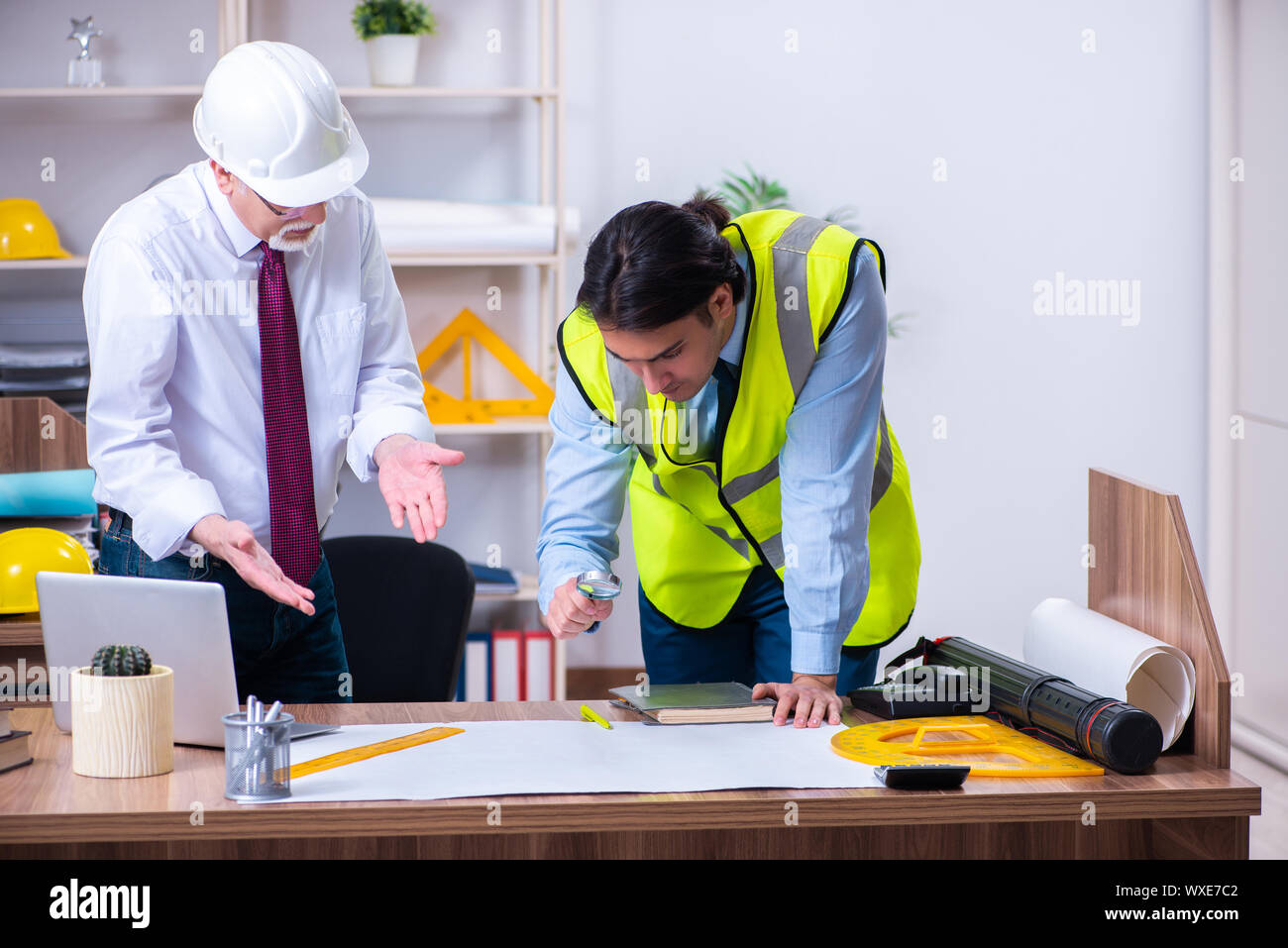 Two architects working on the project Stock Photo - Alamy