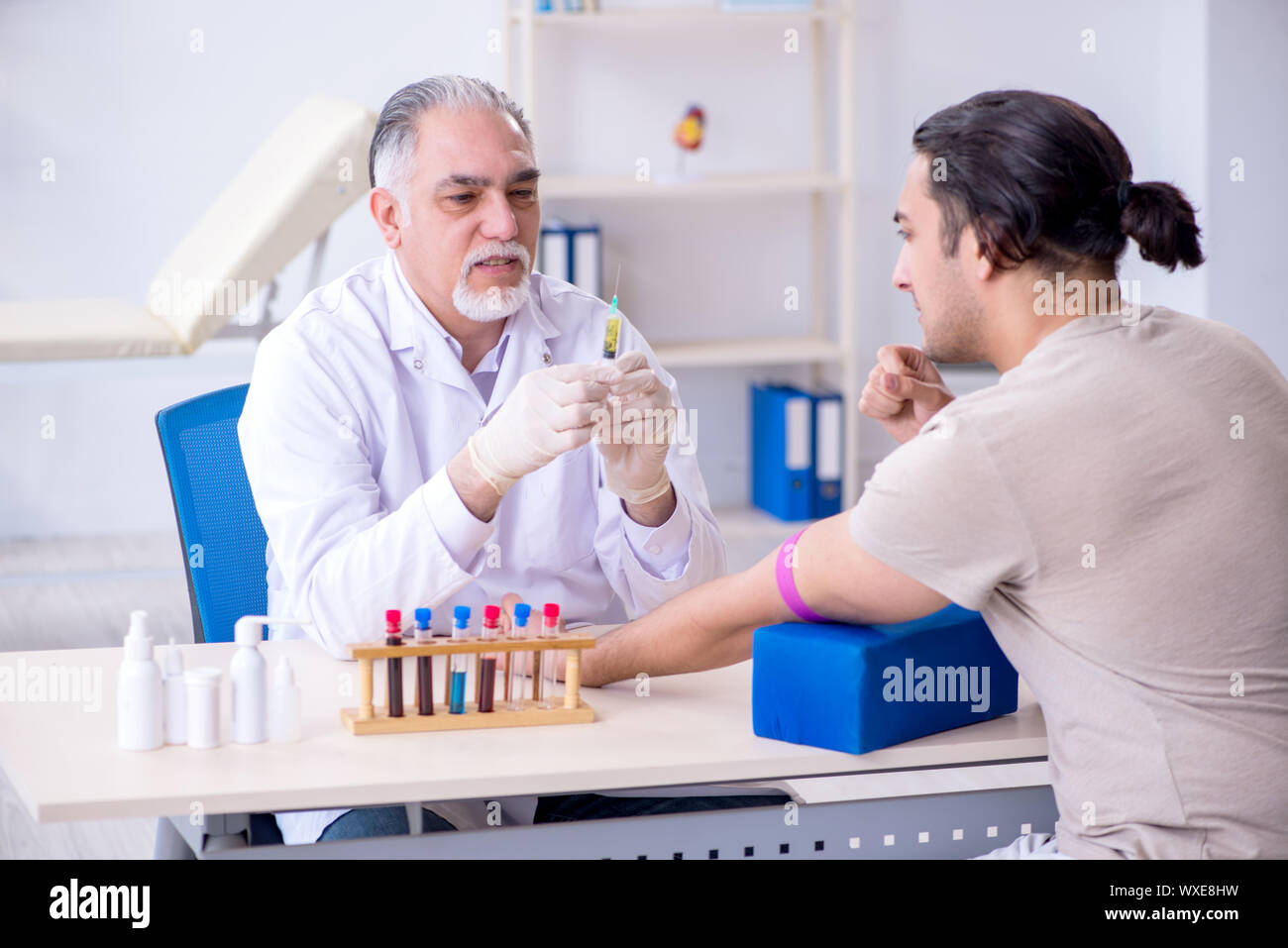 Blood transfusion giving during hi-res stock photography and images - Alamy