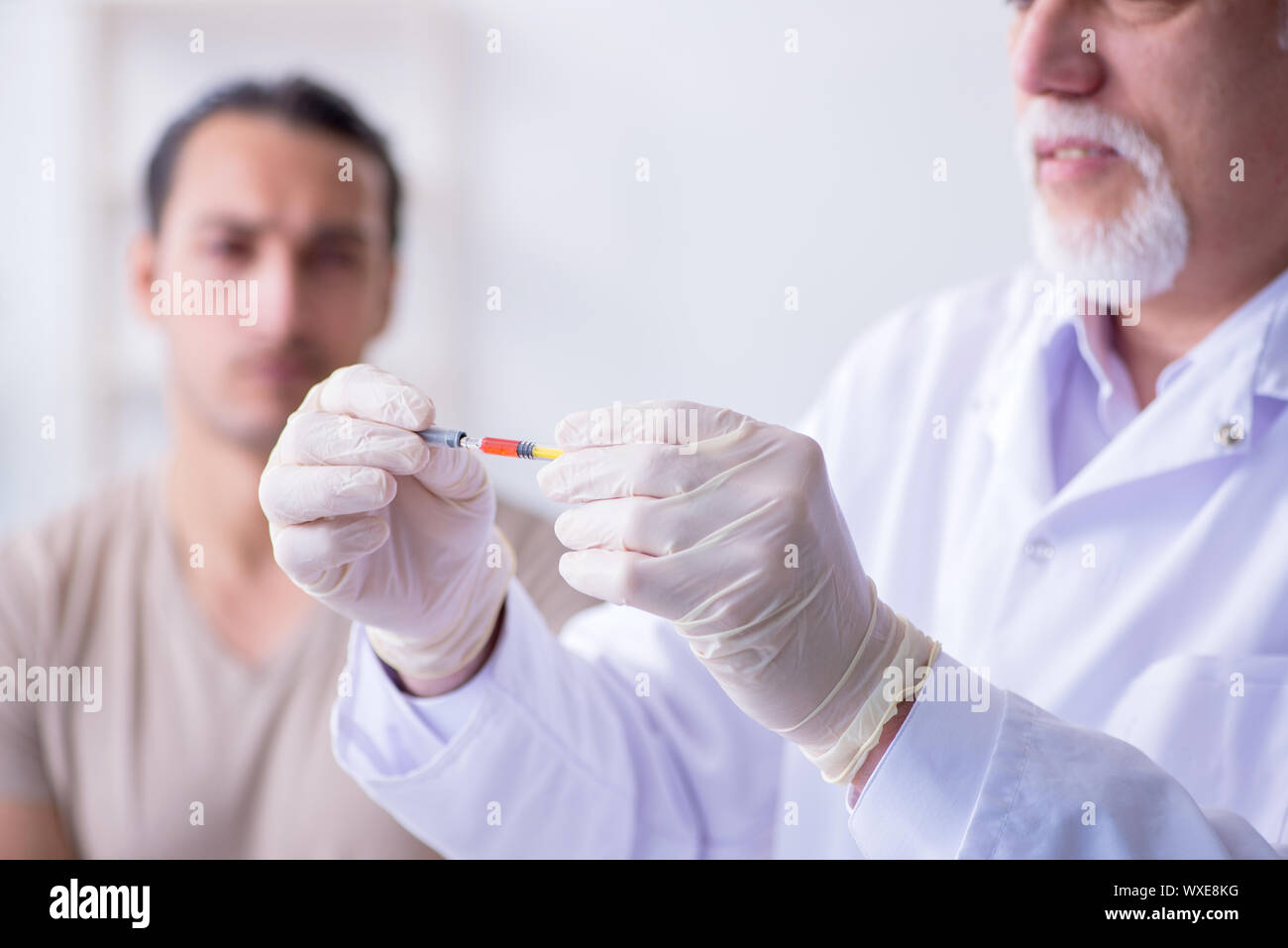 Male patient visitng doctor hi-res stock photography and images - Alamy