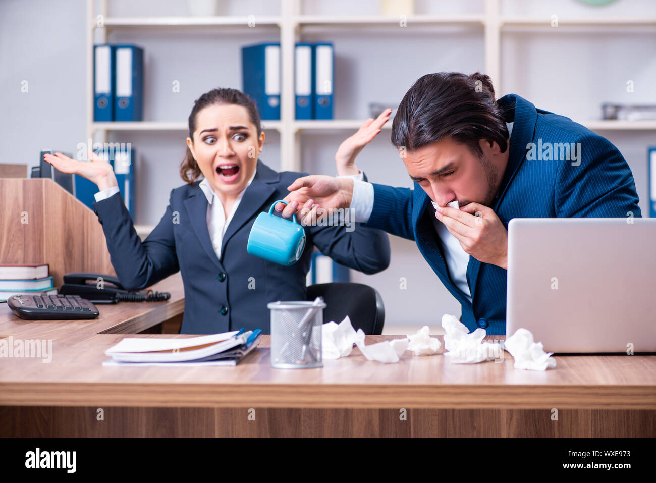 Two employees sick hi-res stock photography and images - Alamy