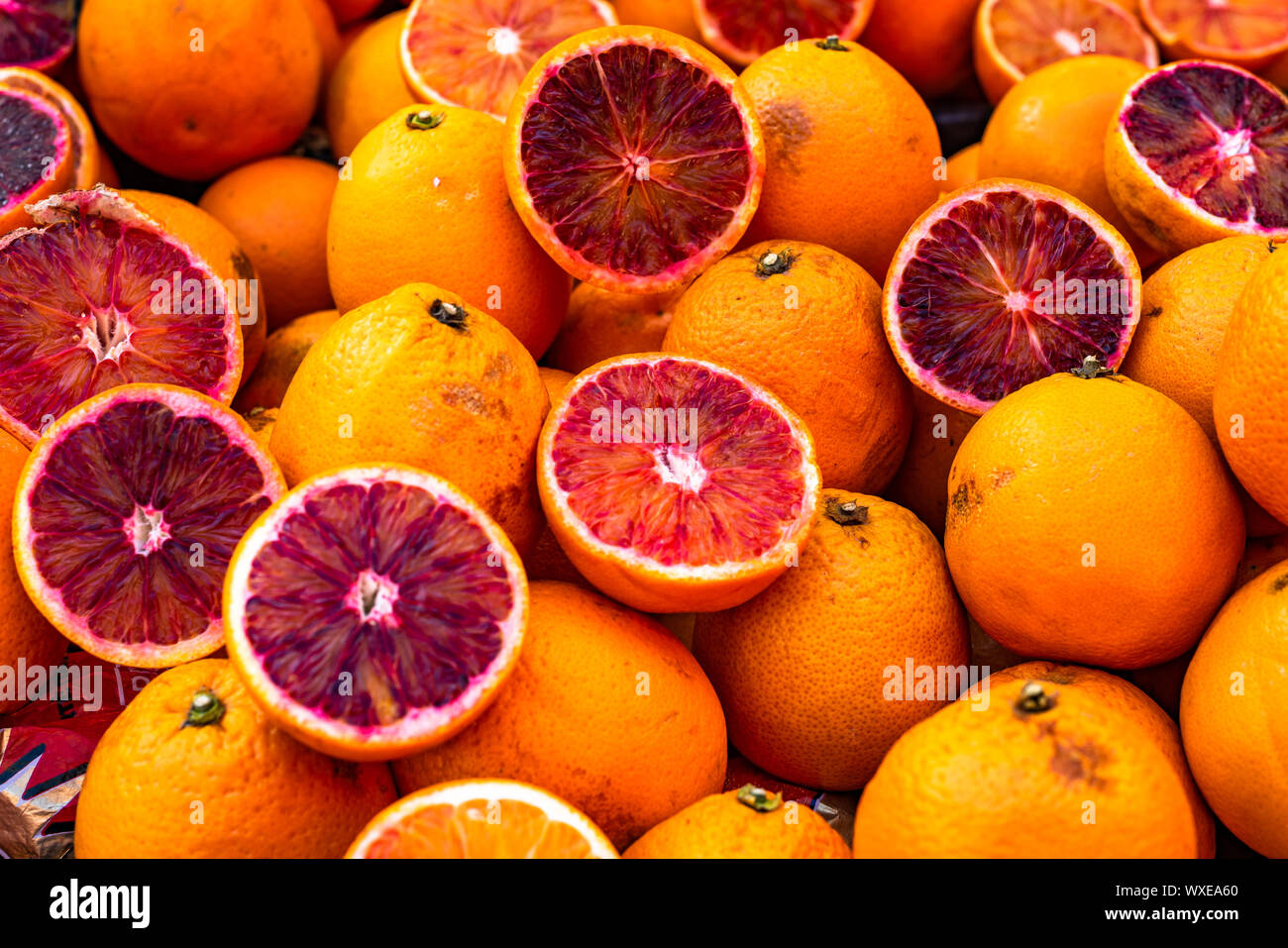 Red sicilian oranges at the street market Stock Photo - Alamy