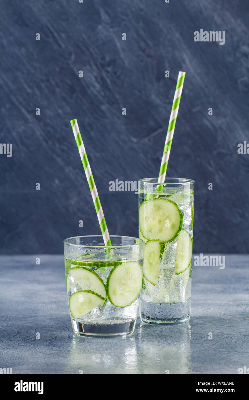 Infused water with cucumber and ice Stock Photo - Alamy