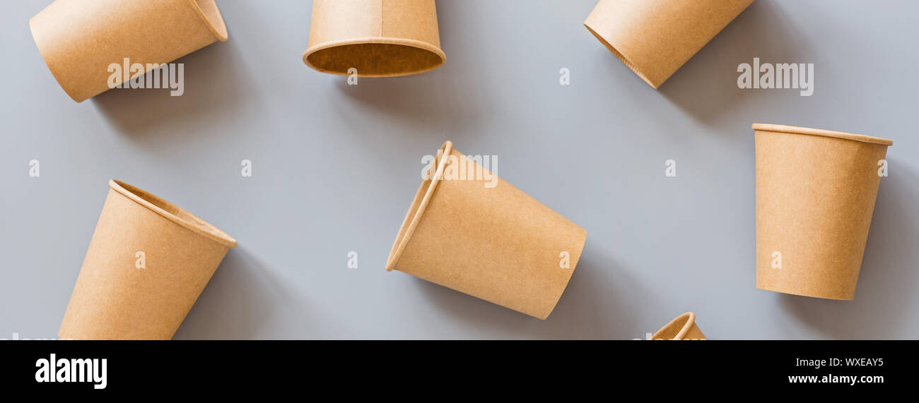 eco natural paper coffee cups flat lay on gray background. sustainable ...
