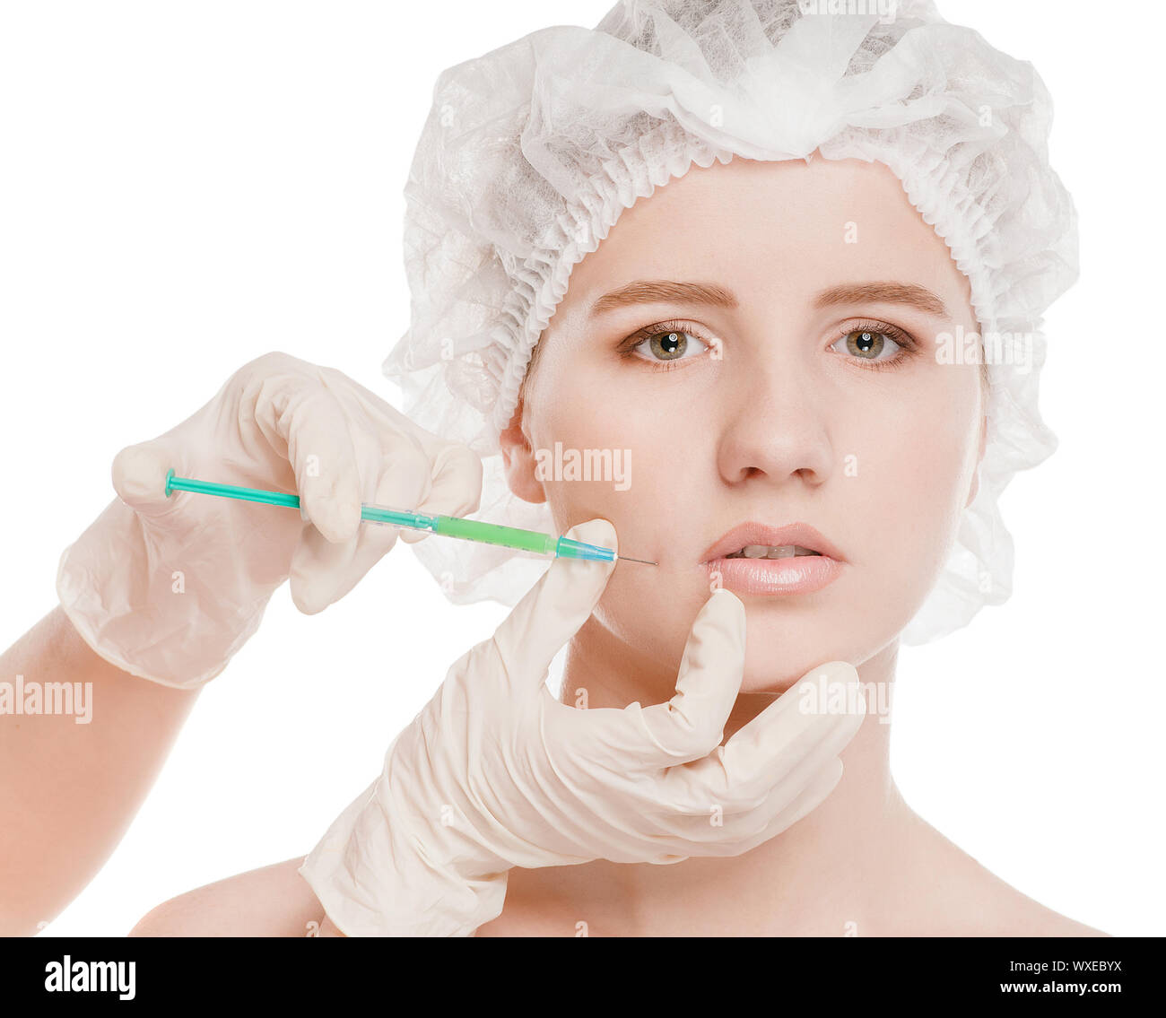 Cosmetic botox injection in the female face. Lips and cheek zone ...