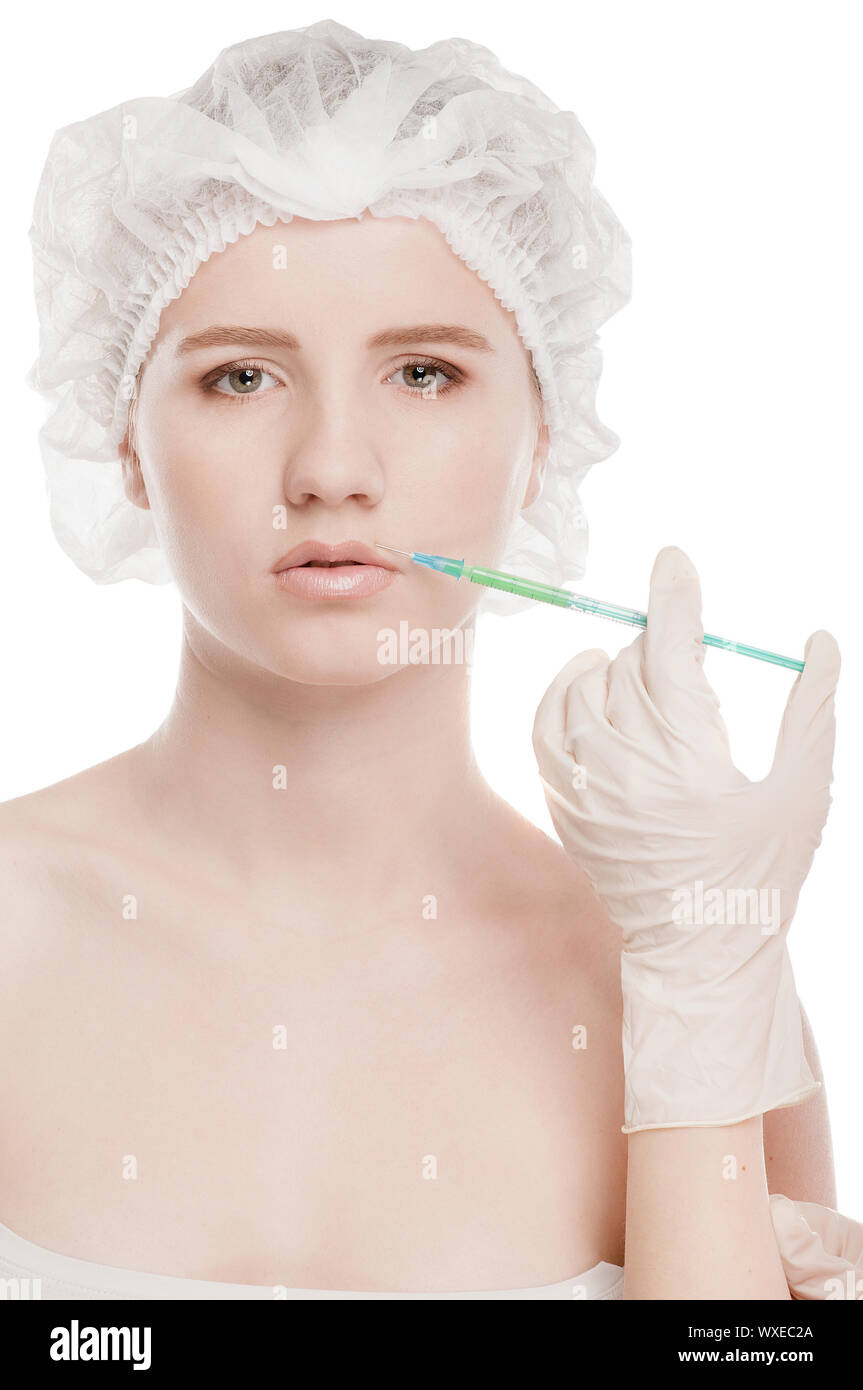 Cosmetic botox injection in the female face. Lips and cheek zone ...