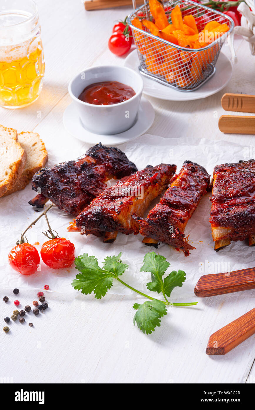 BBQ spare ribs from a charcoal grill Stock Photo - Alamy