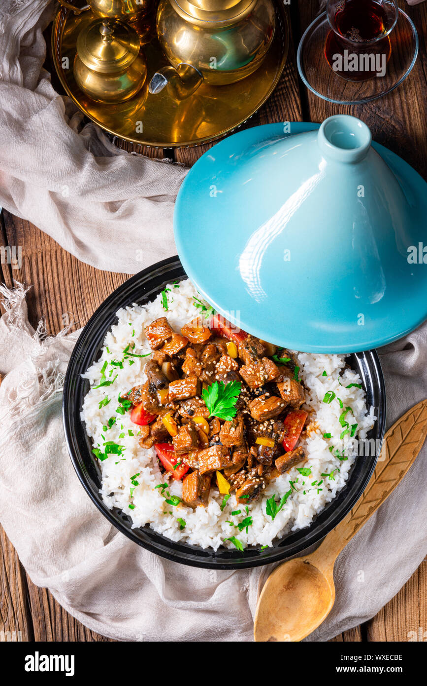 Tajin beef stew with rice paprika and sesame seeds Stock Photo - Alamy