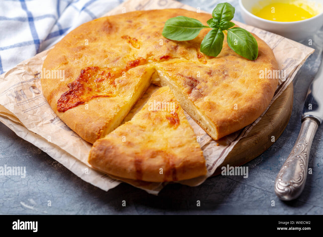 Traditional Georgian closed pie with cheese Stock Photo - Alamy