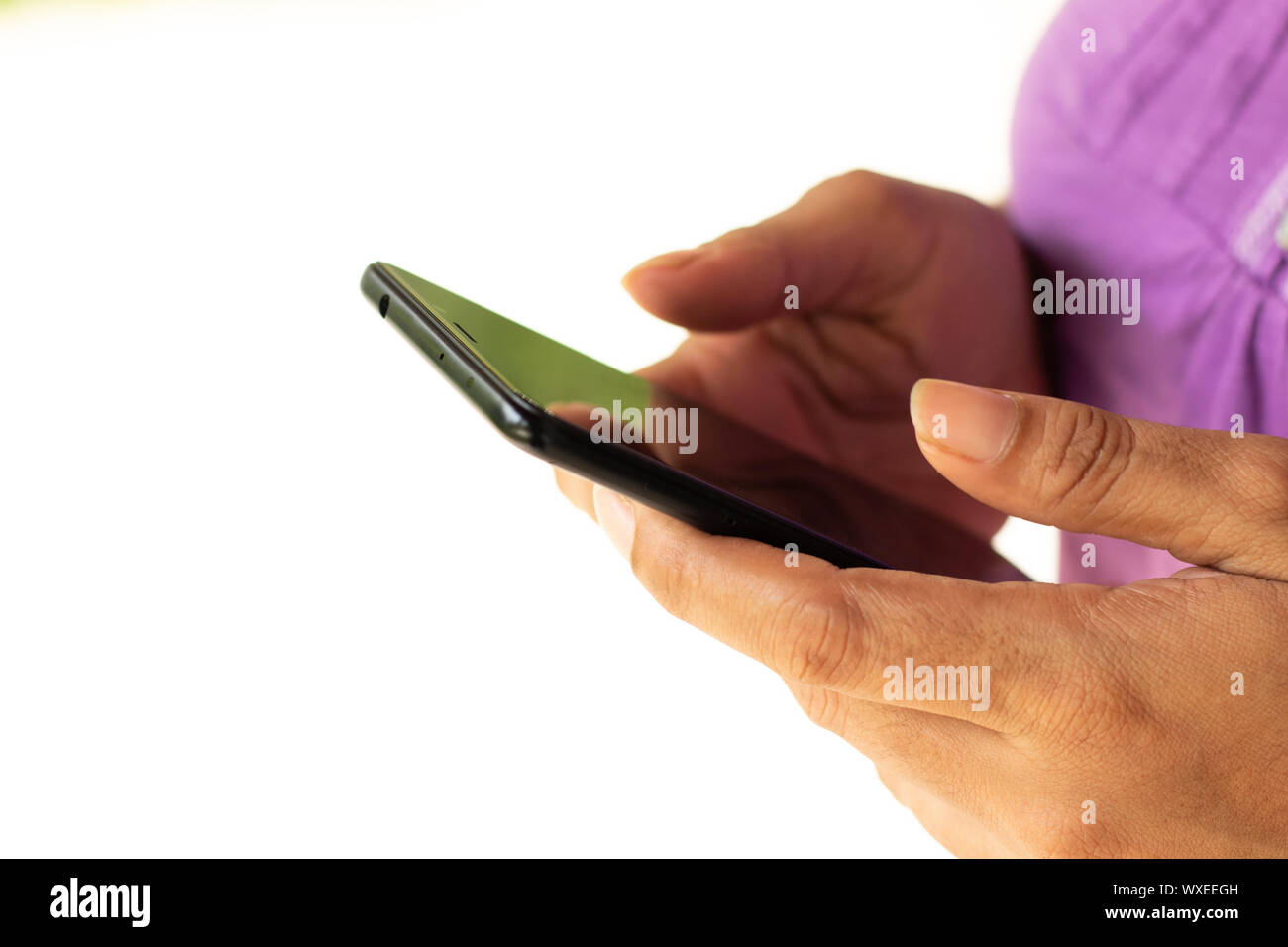 girl hold the phone outside Stock Photo - Alamy