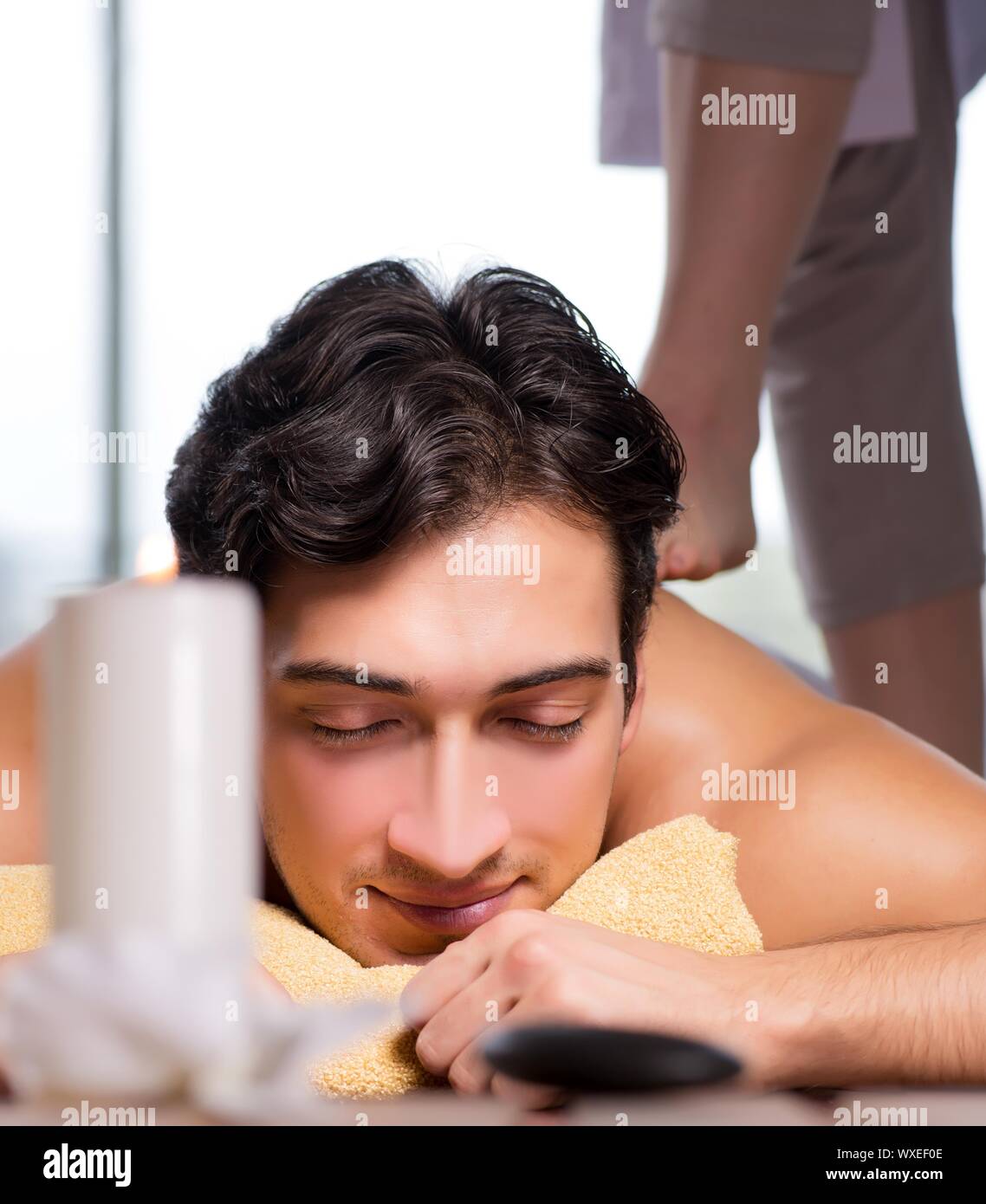 Tired young doctor lying hi-res stock photography and images - Alamy