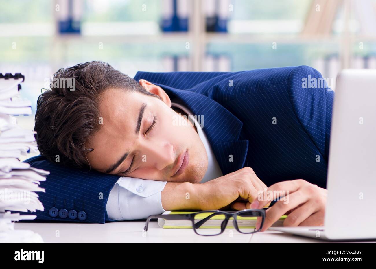 Tired businessman exhausted after hard work and excessive worklo Stock ...