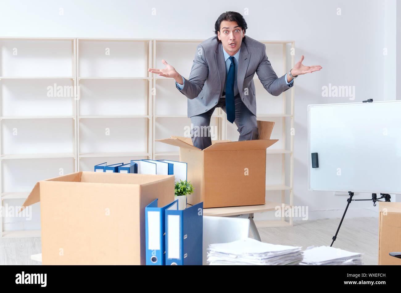 Lay off boxes office hi-res stock photography and images - Alamy