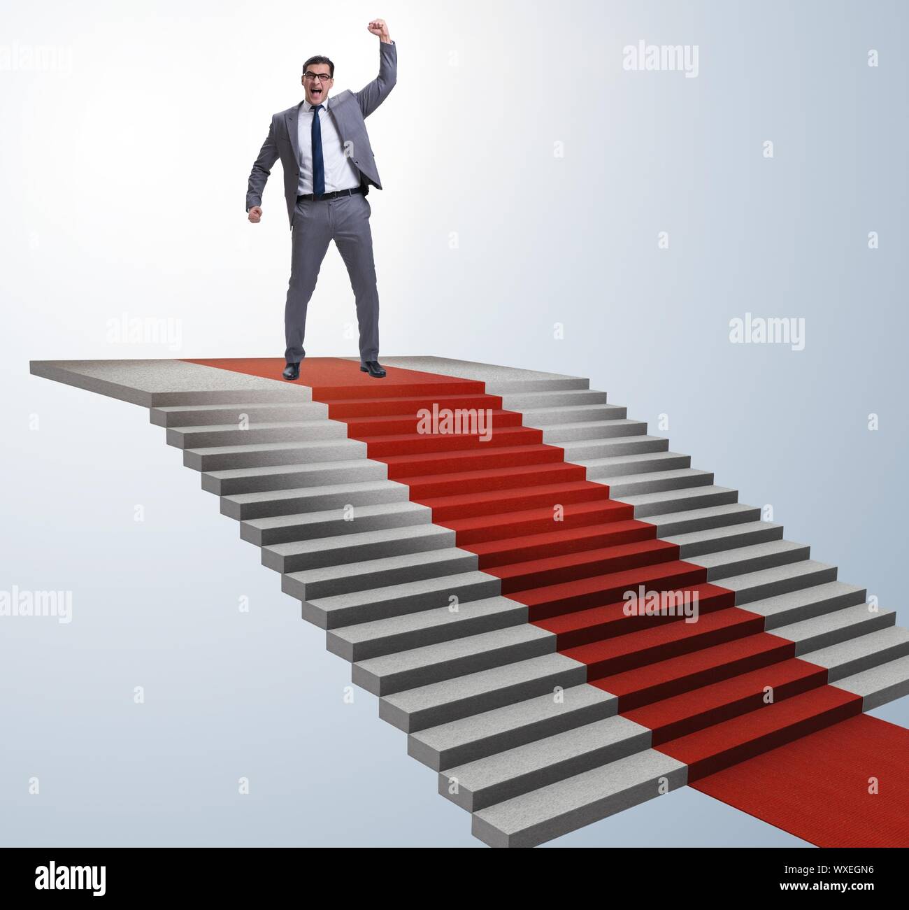 Young businessman climbing stairs and red carpet Stock Photo - Alamy