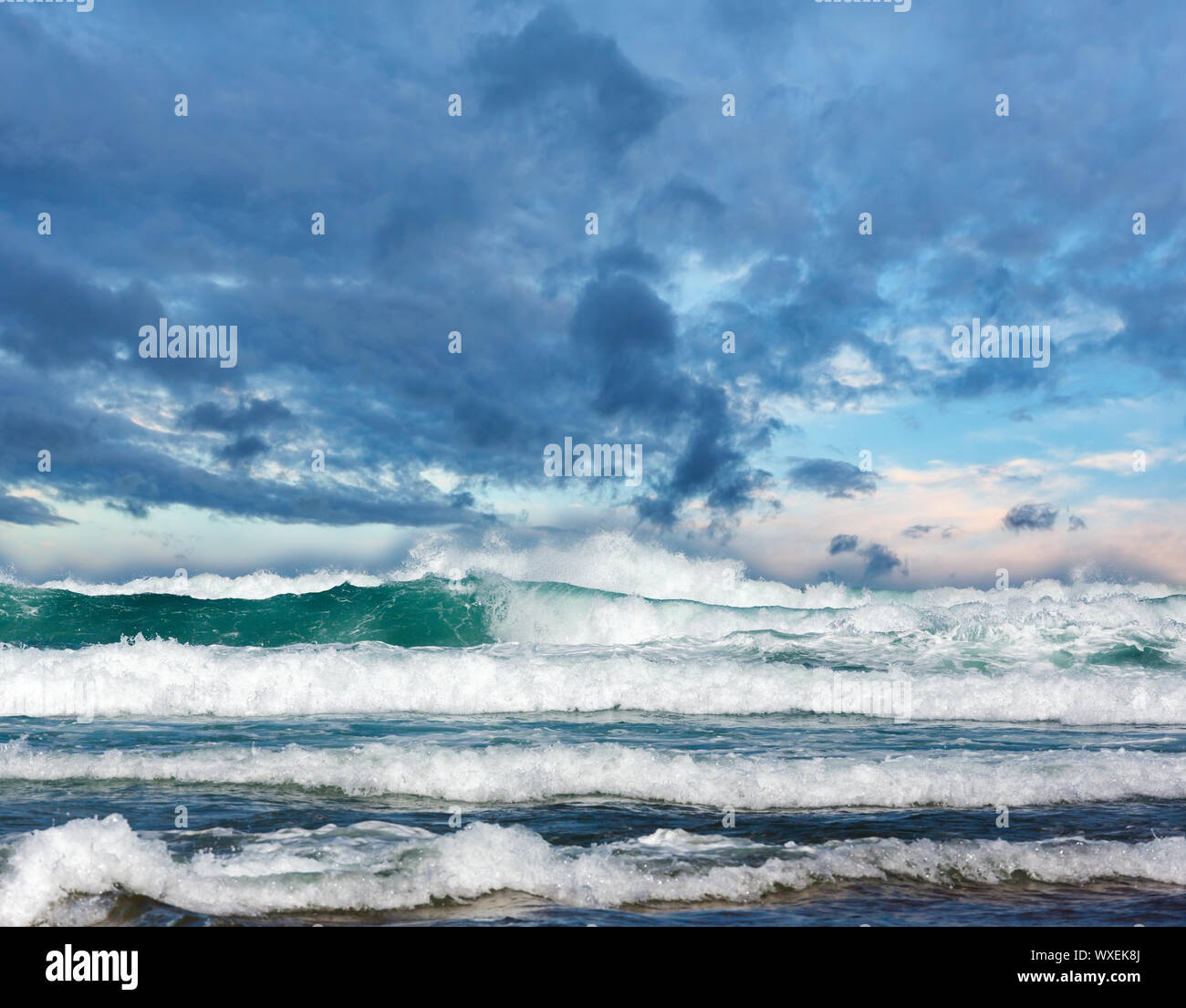 Sea coast view and stormy surf with splashes hi-res stock photography ...