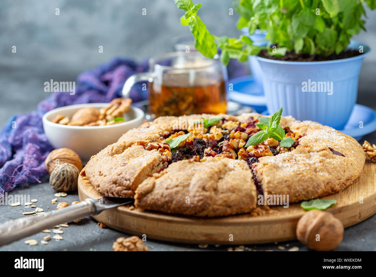 Galette pie with black currant for breakfast Stock Photo - Alamy