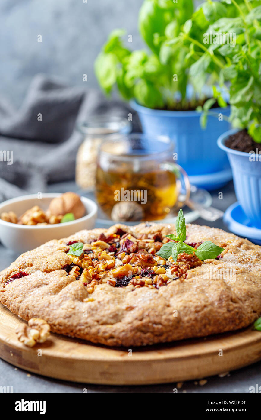 Homemade galette pie with currants and walnuts Stock Photo - Alamy