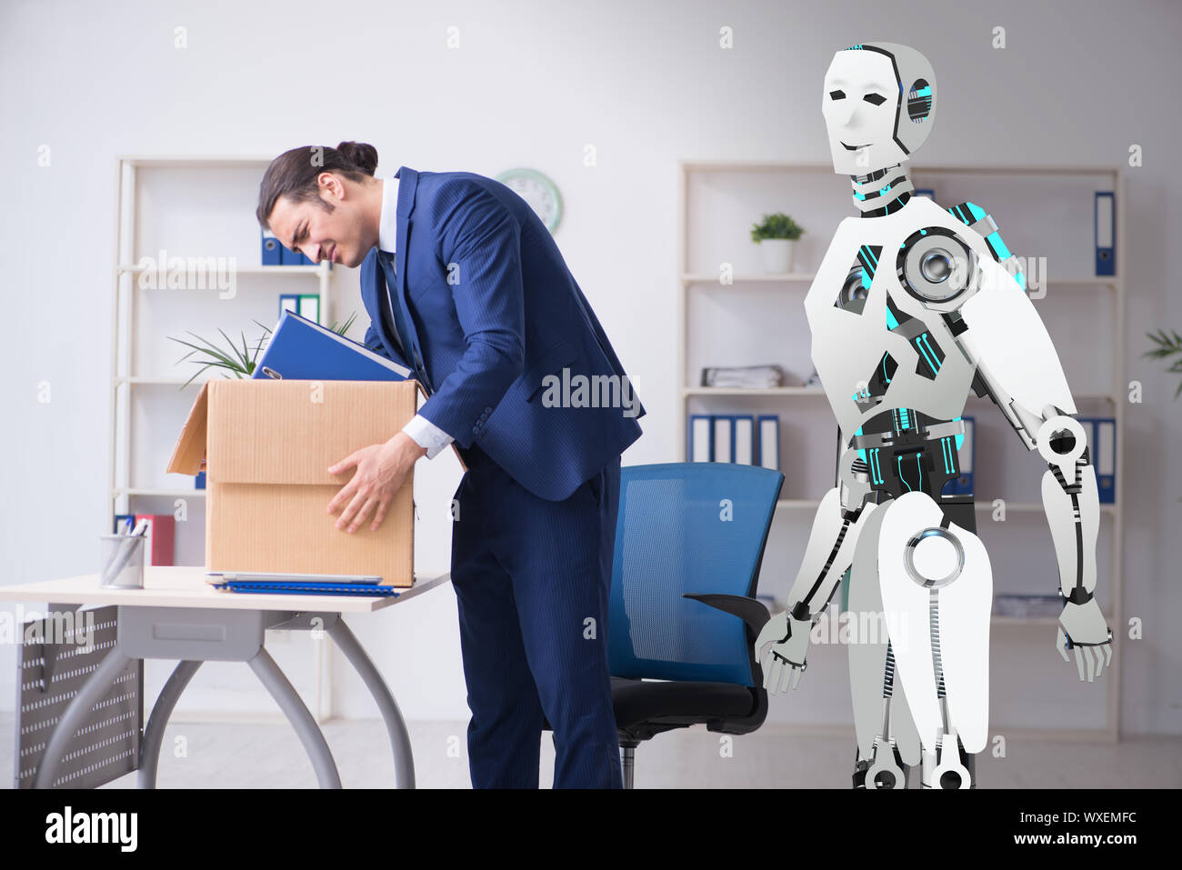 Concept of robots replacing humans in offices Stock Photo - Alamy