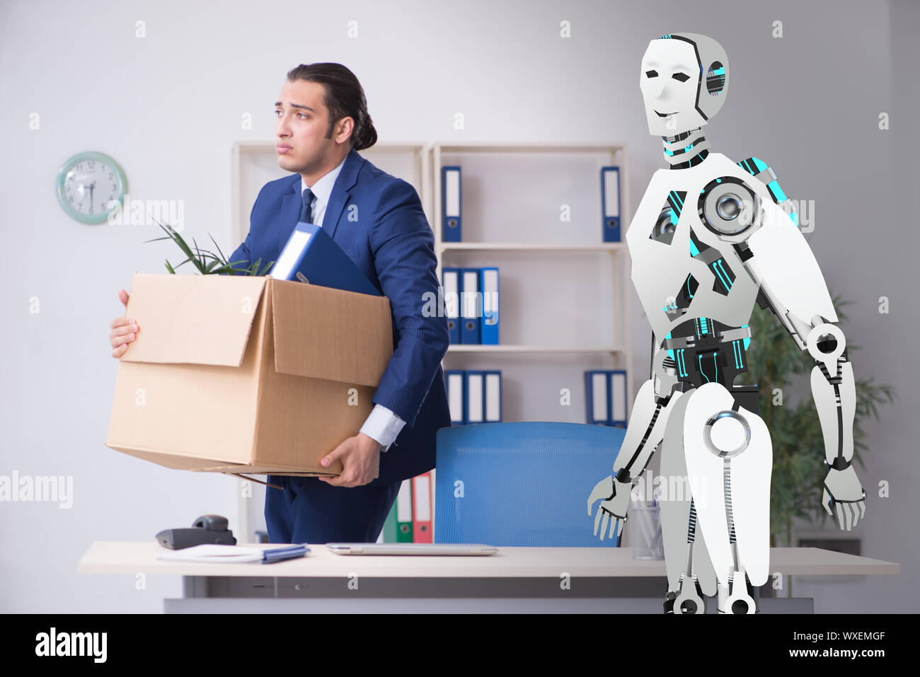 Concept of robots replacing humans in offices Stock Photo - Alamy