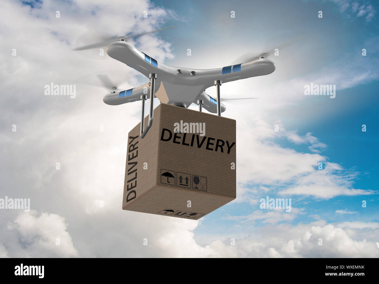 Drone delivery concept with box in air Stock Photo - Alamy