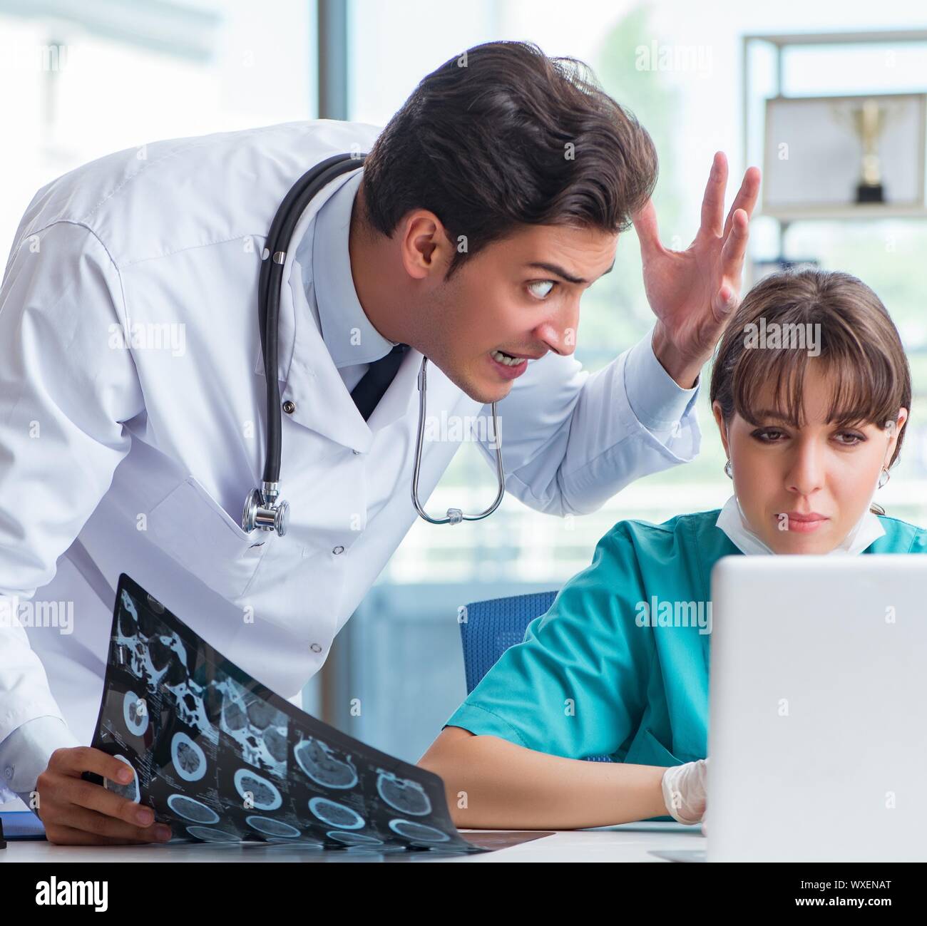 Woman angry at man hospital hi-res stock photography and images - Alamy