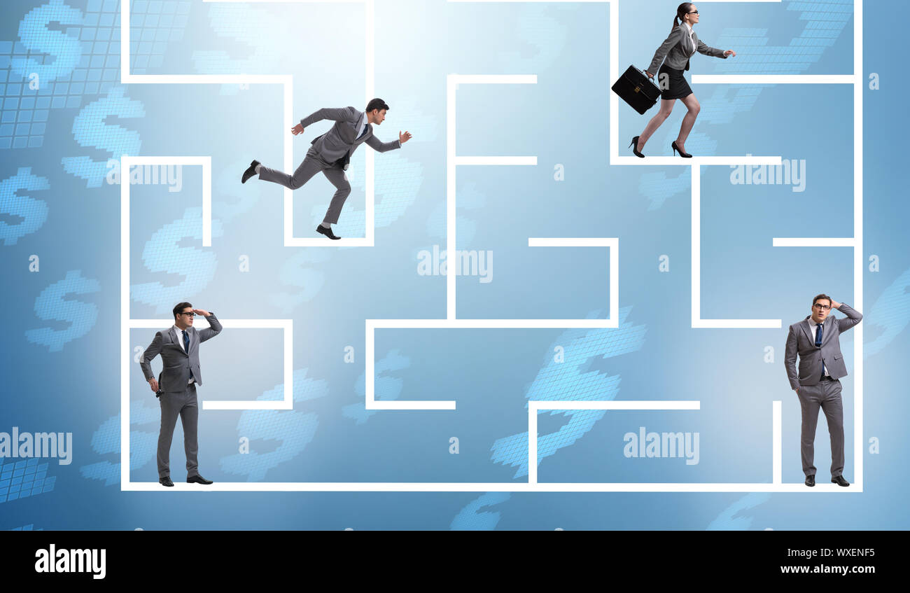 Business people getting lost in maze uncertainty concept Stock Photo ...
