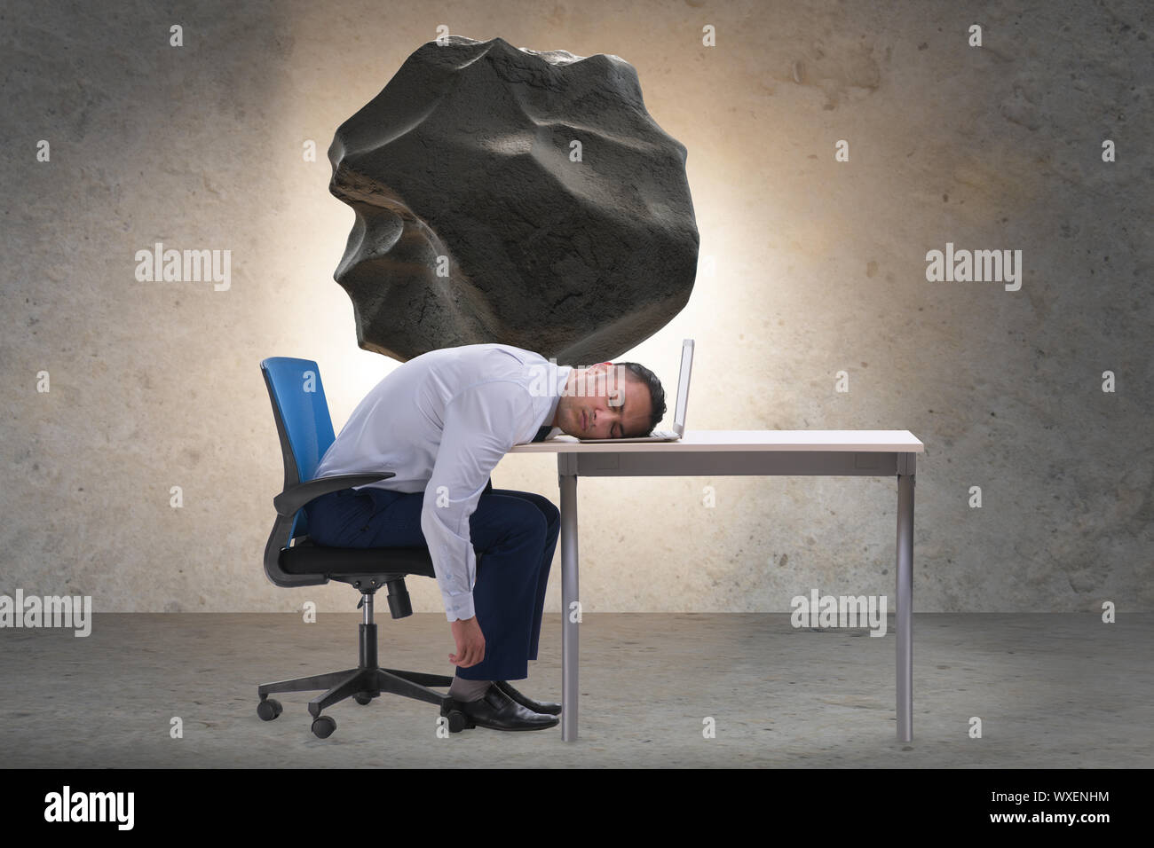 Employee under the burden of work Stock Photo - Alamy