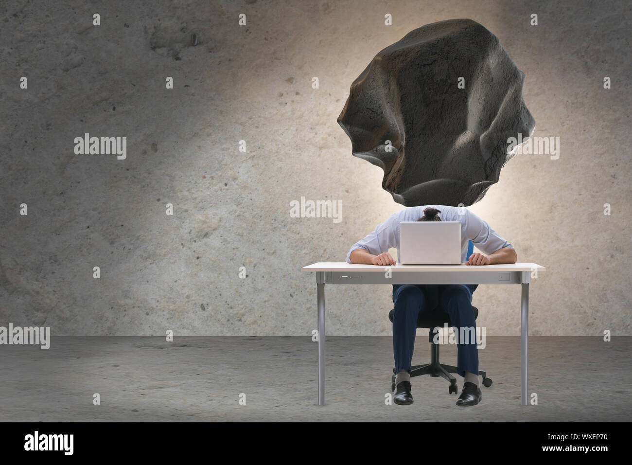 Employee under the burden of work Stock Photo - Alamy