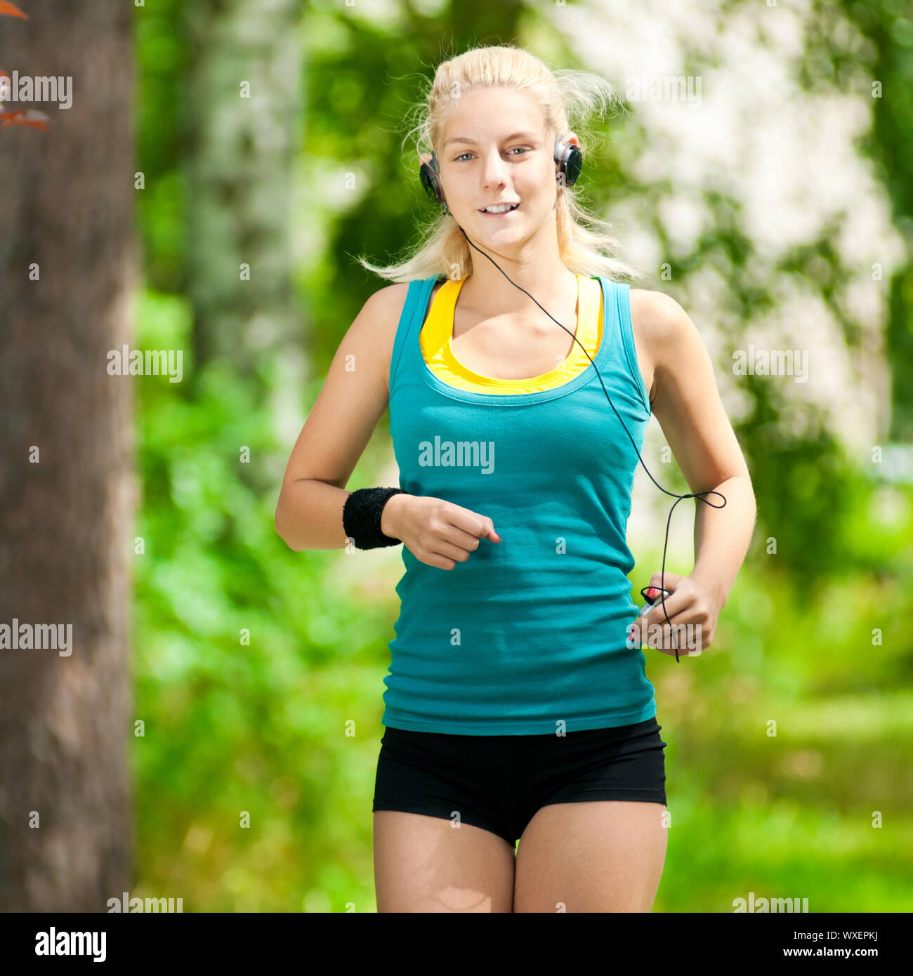 Happy girl teenager running clean hi-res stock photography and images ...