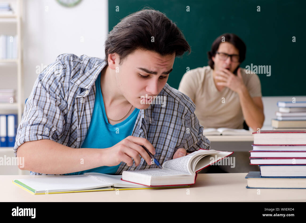 Two male students in the classroom Stock Photo - Alamy