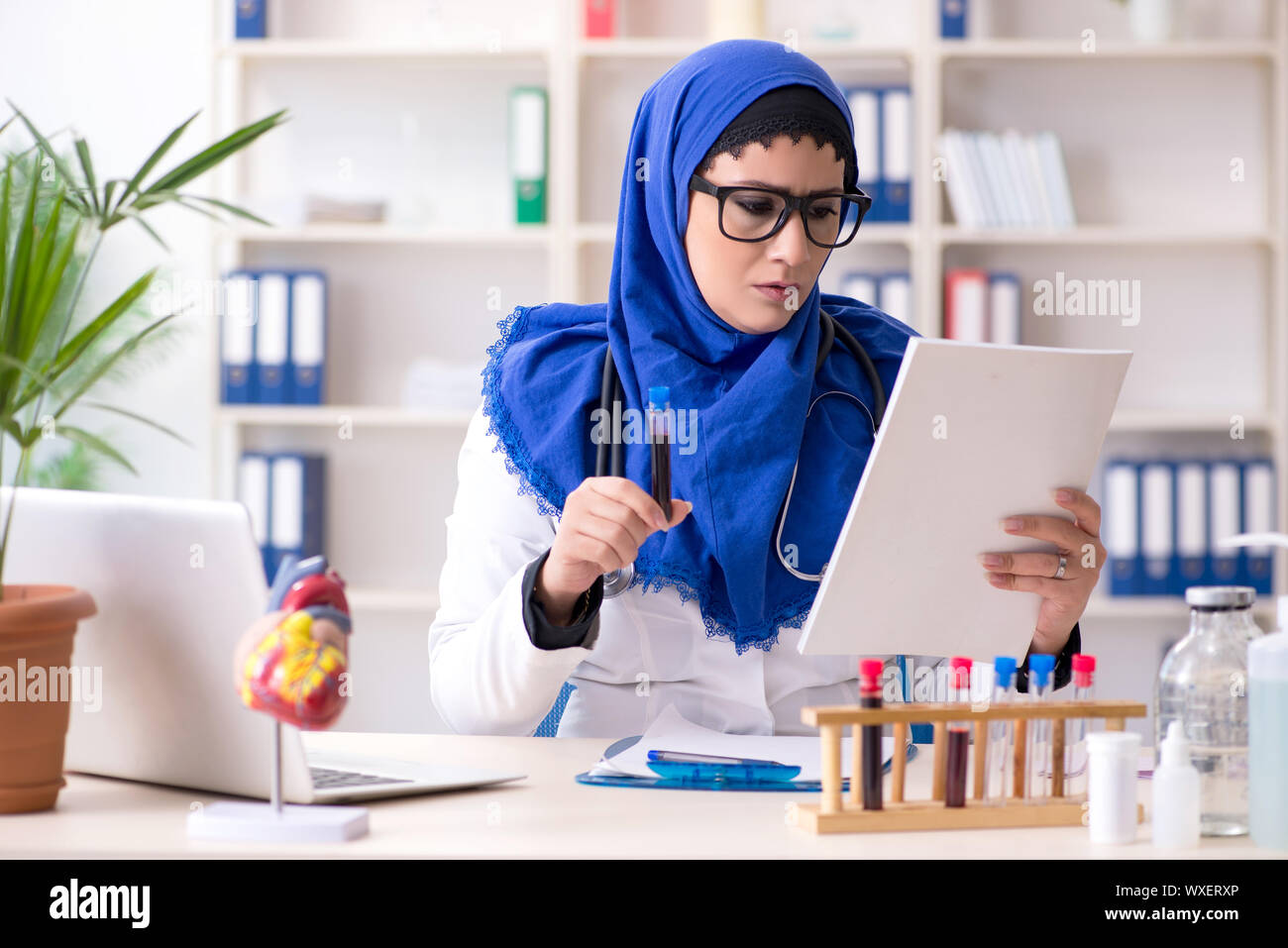 Female doctor in hijab working in the hospital Stock Photo - Alamy