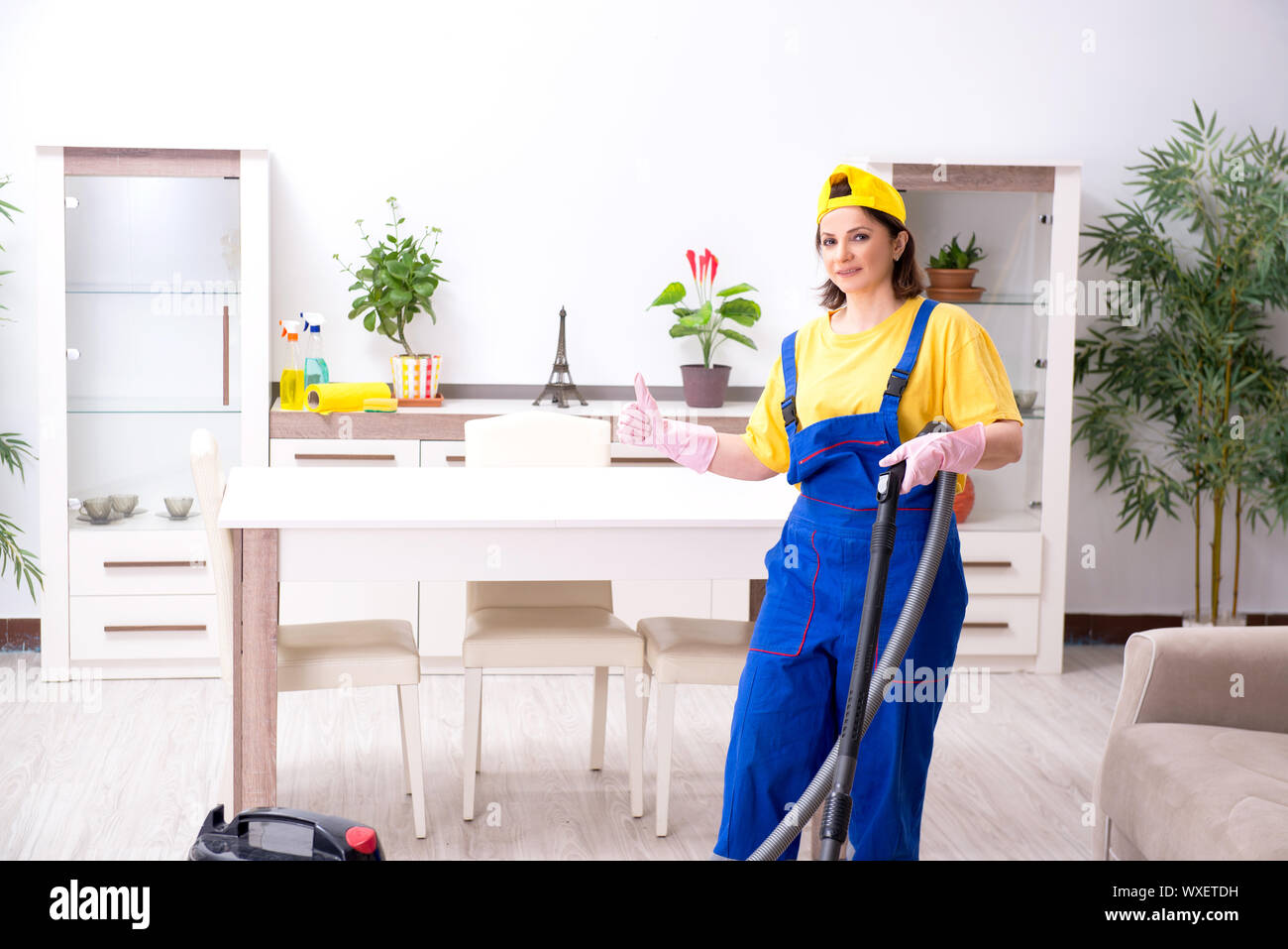 Old woman maid uniform hi-res stock photography and images - Alamy