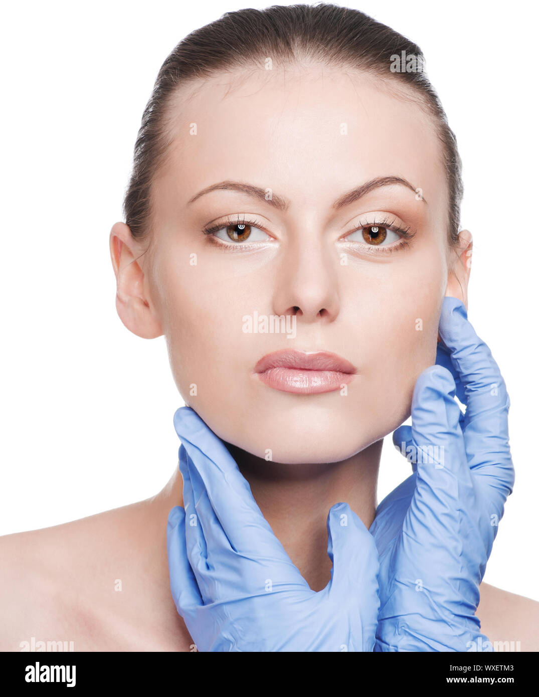 Beautician touch and exam health woman face. Plastic surgery. Isolated ...