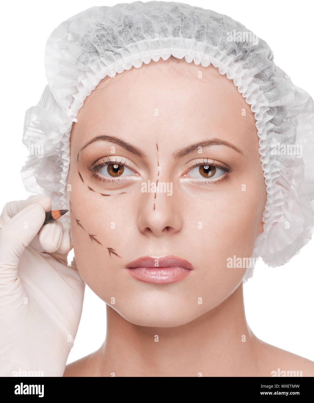 Beautician touch and draw correction lines on woman face. Before ...