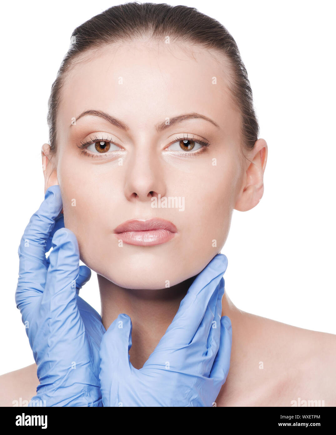 Beautician touch and exam health woman face. Plastic surgery. Isolated ...