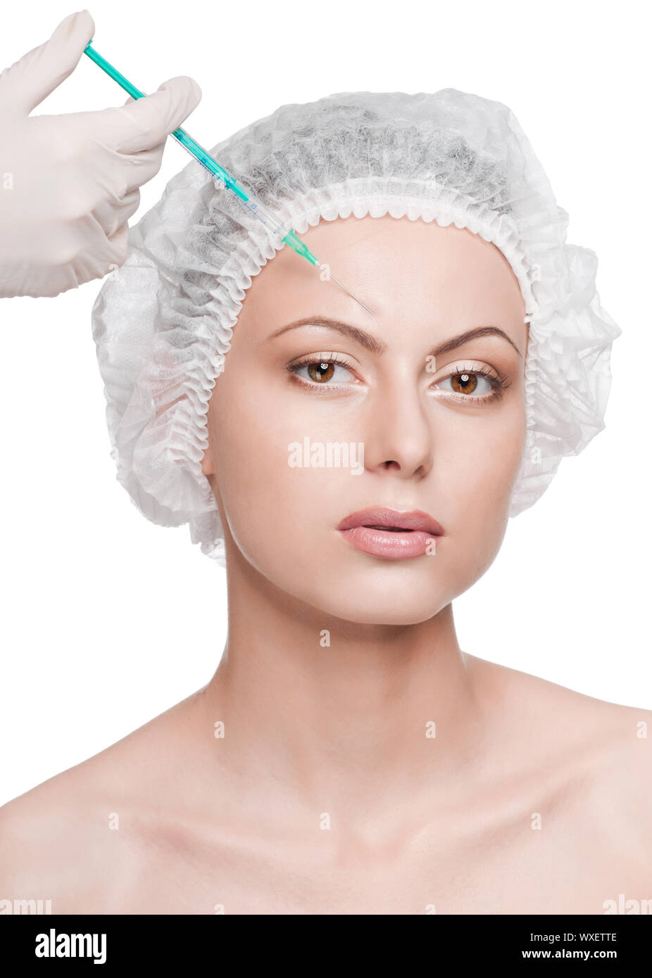 Cosmetic botox injection in the female face. Eyebrow zone. Isolated ...