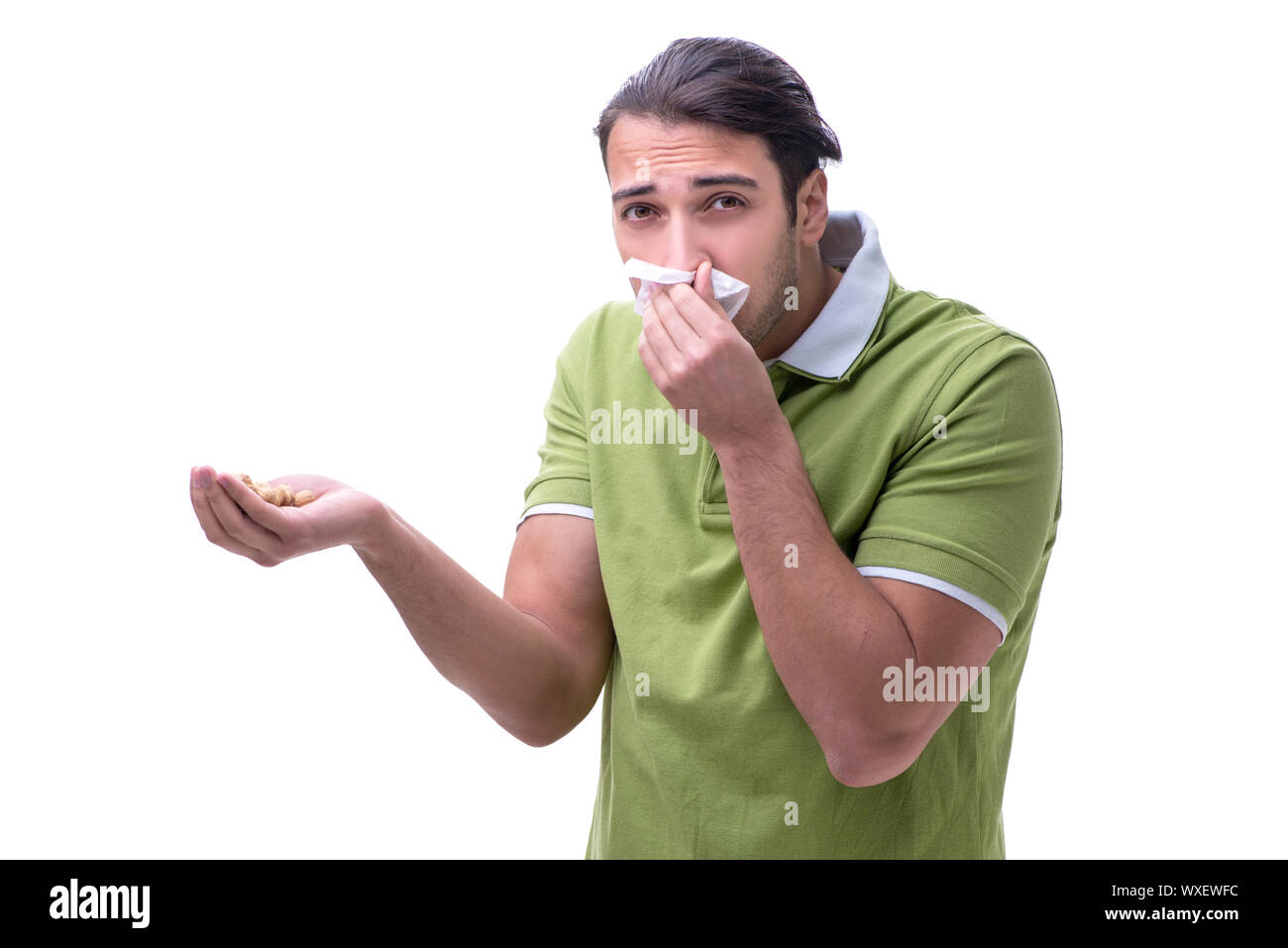 Young man suffering from allergy isolated on white Stock Photo - Alamy