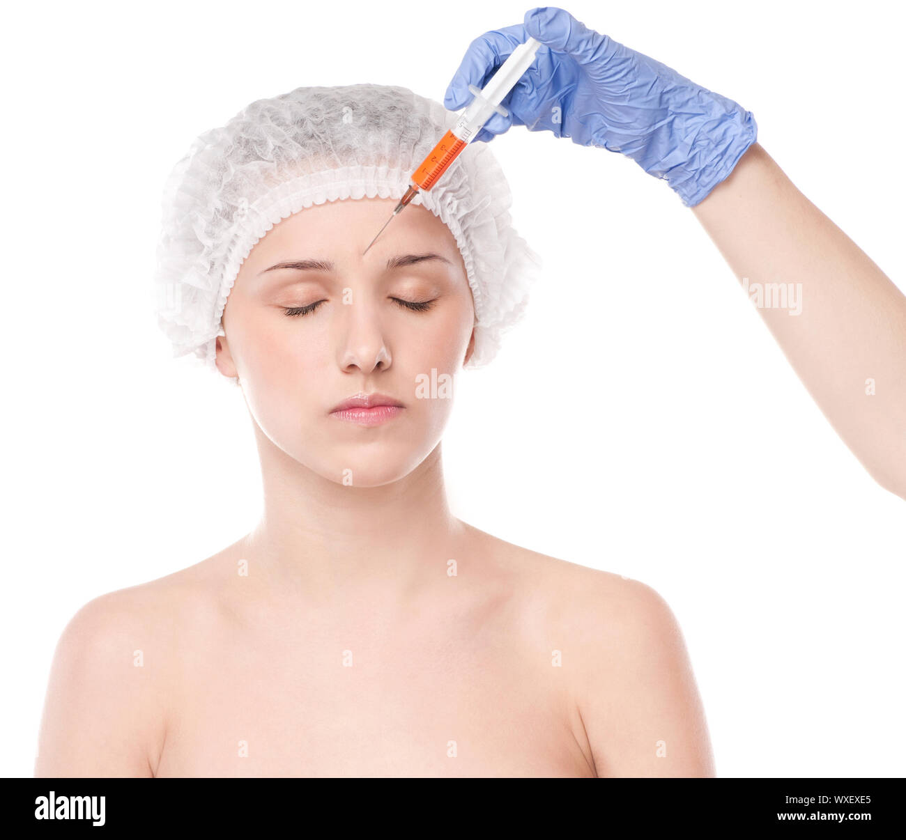 Cosmetic botox injection in the female face. Eye and eyebrow zone ...