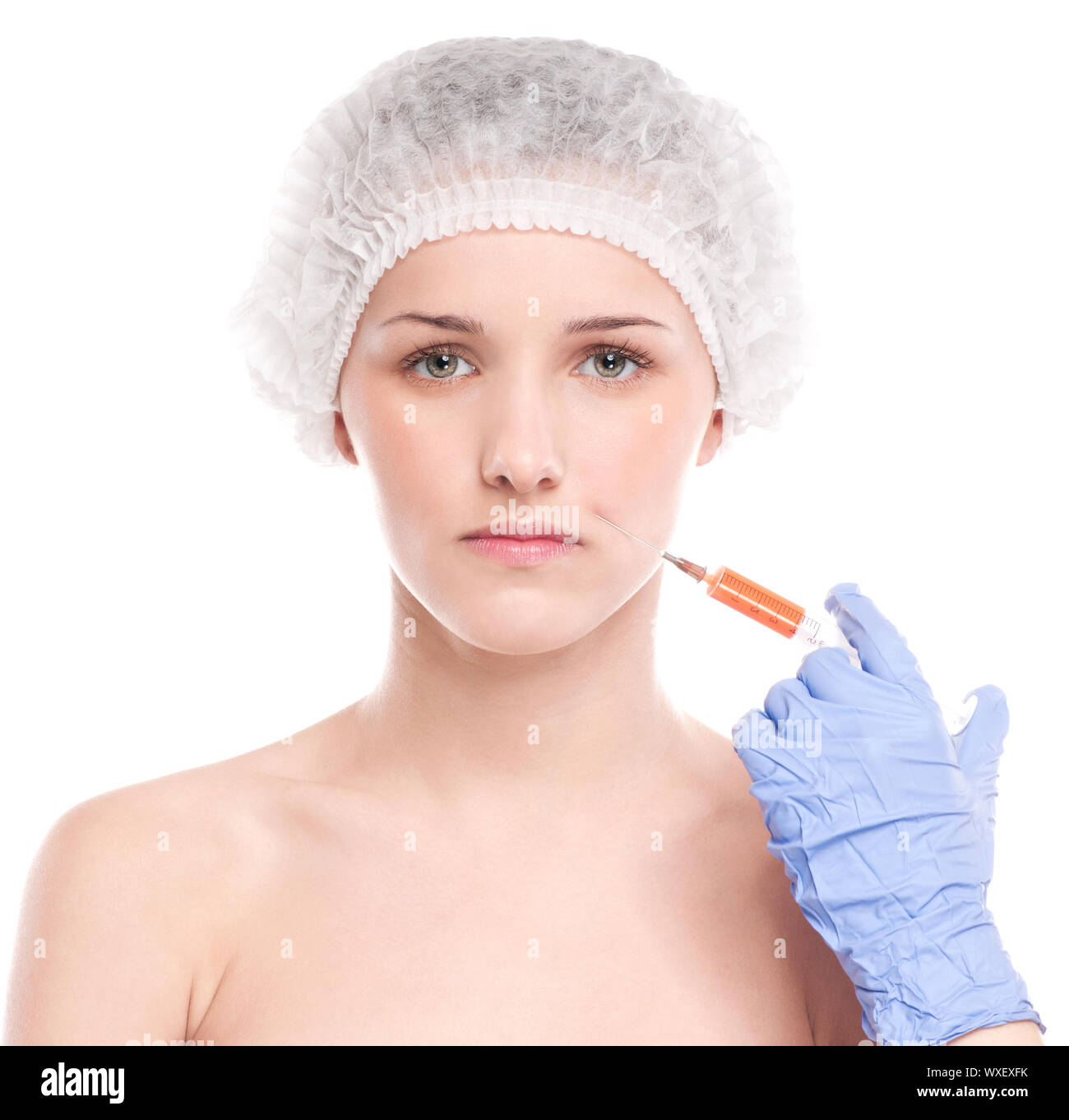Cosmetic botox injection in the female face. Lips and cheek zone ...