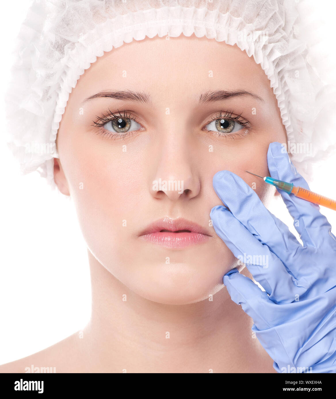 Cosmetic botox injection in the female face. Cheek zone. Isolated on ...