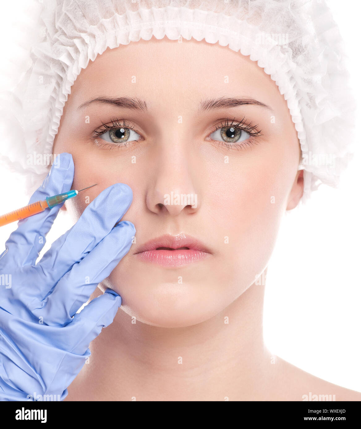 Cosmetic botox injection in the female face. Cheek zone. Isolated on ...