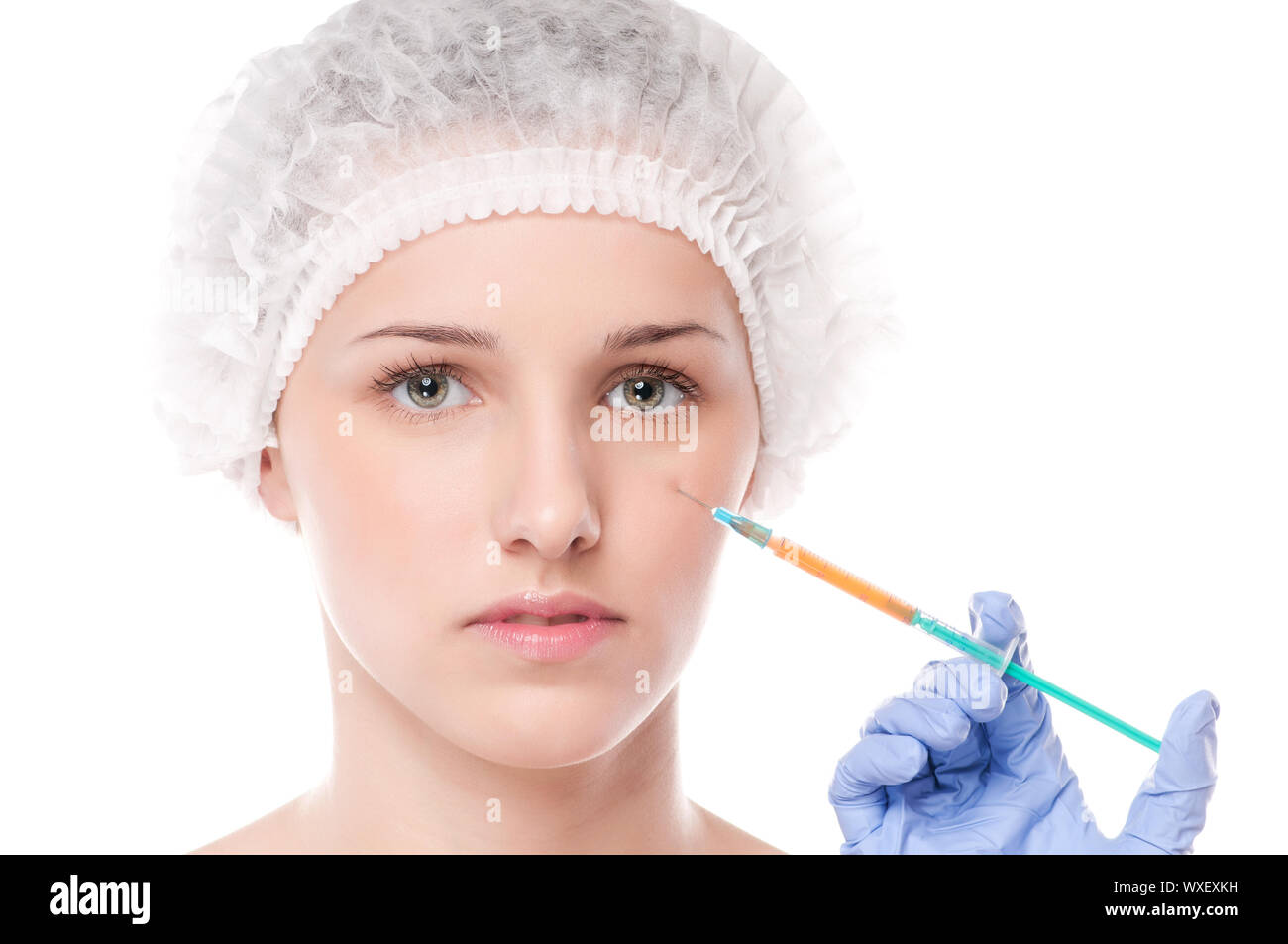 Cosmetic botox injection in the female face. Cheek zone. Isolated on ...