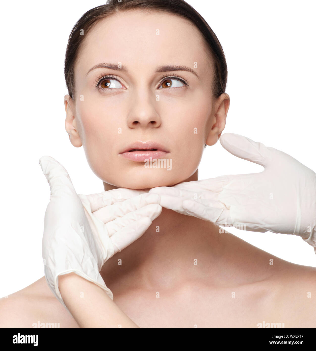 Beautician touch and exam health woman face. Plastic surgery. Isolated ...