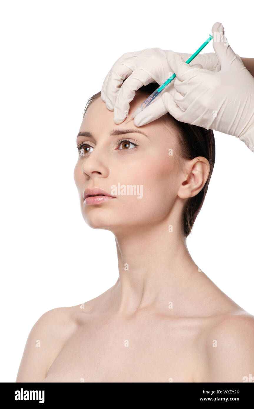 Cosmetic botox injection in the female face. Eyebrow zone. Isolated ...