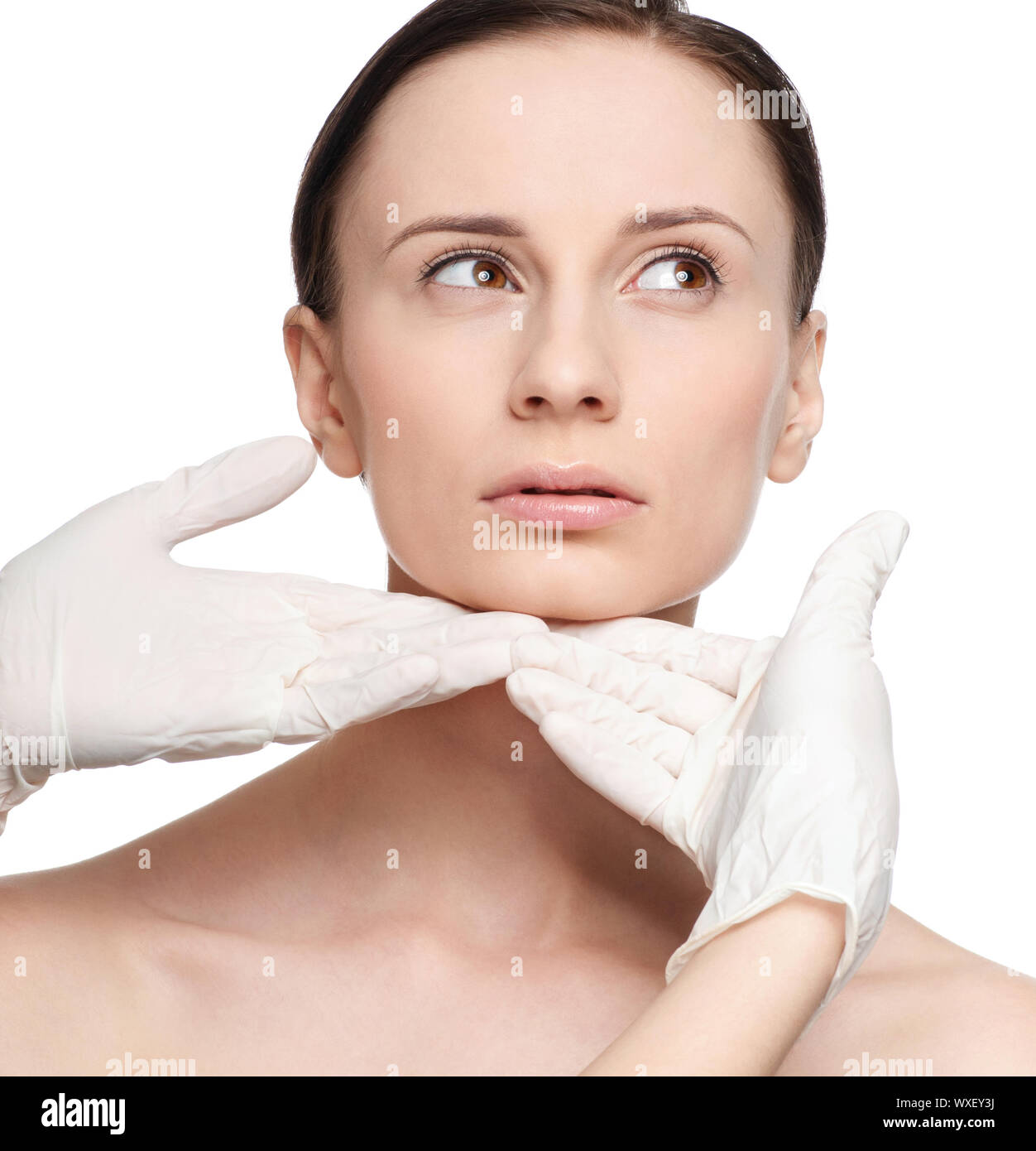 Beautician touch and exam health woman face. Plastic surgery. Isolated ...