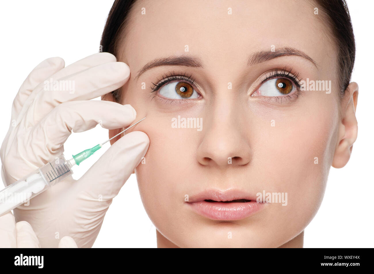 Cosmetic botox injection in the female face. Eye zone. Isolated Stock ...