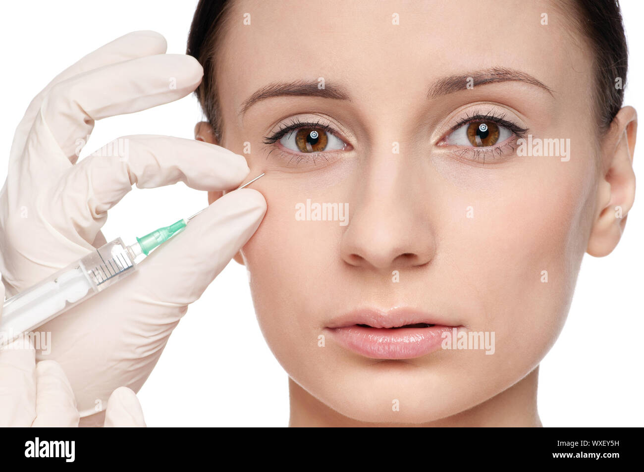 Cosmetic botox injection in the female face. Eye zone. Isolated Stock ...