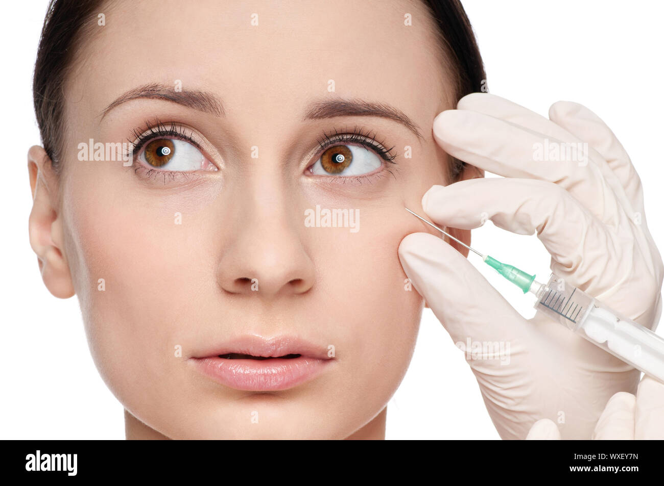 Cosmetic botox injection in the female face. Eye zone. Isolated Stock ...