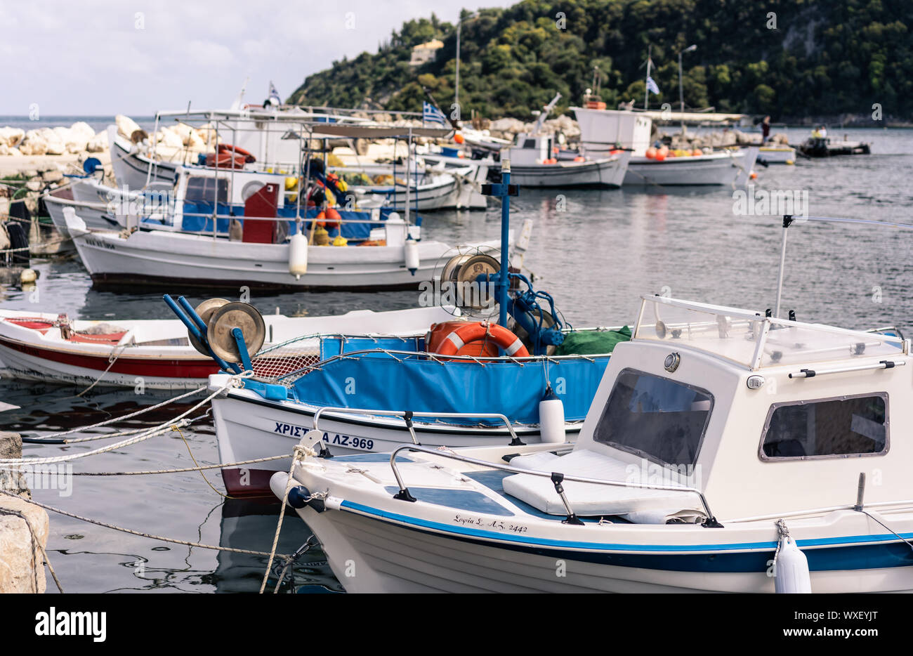 Boats in port near Keri beach Stock Photo - Alamy