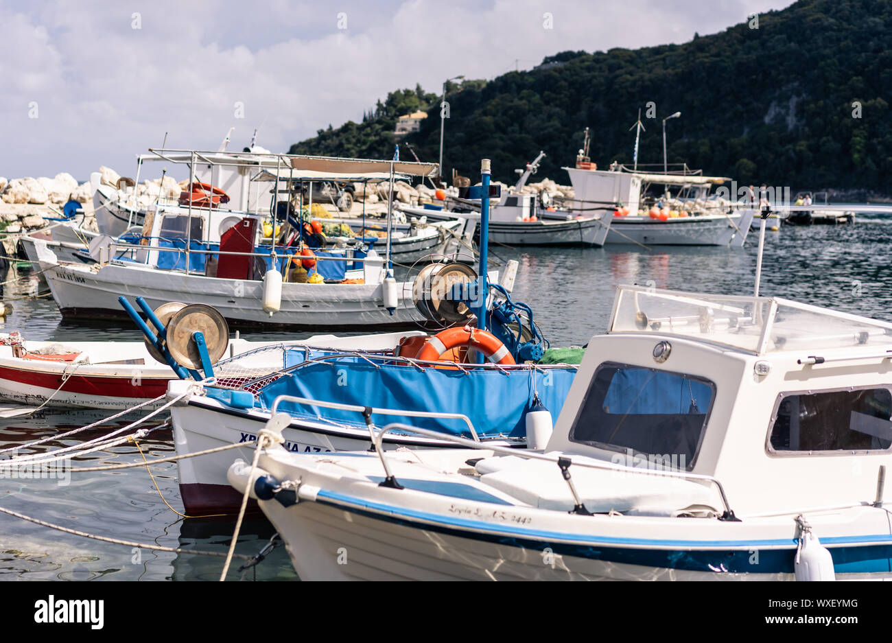 Boats in port near Keri beach Stock Photo - Alamy